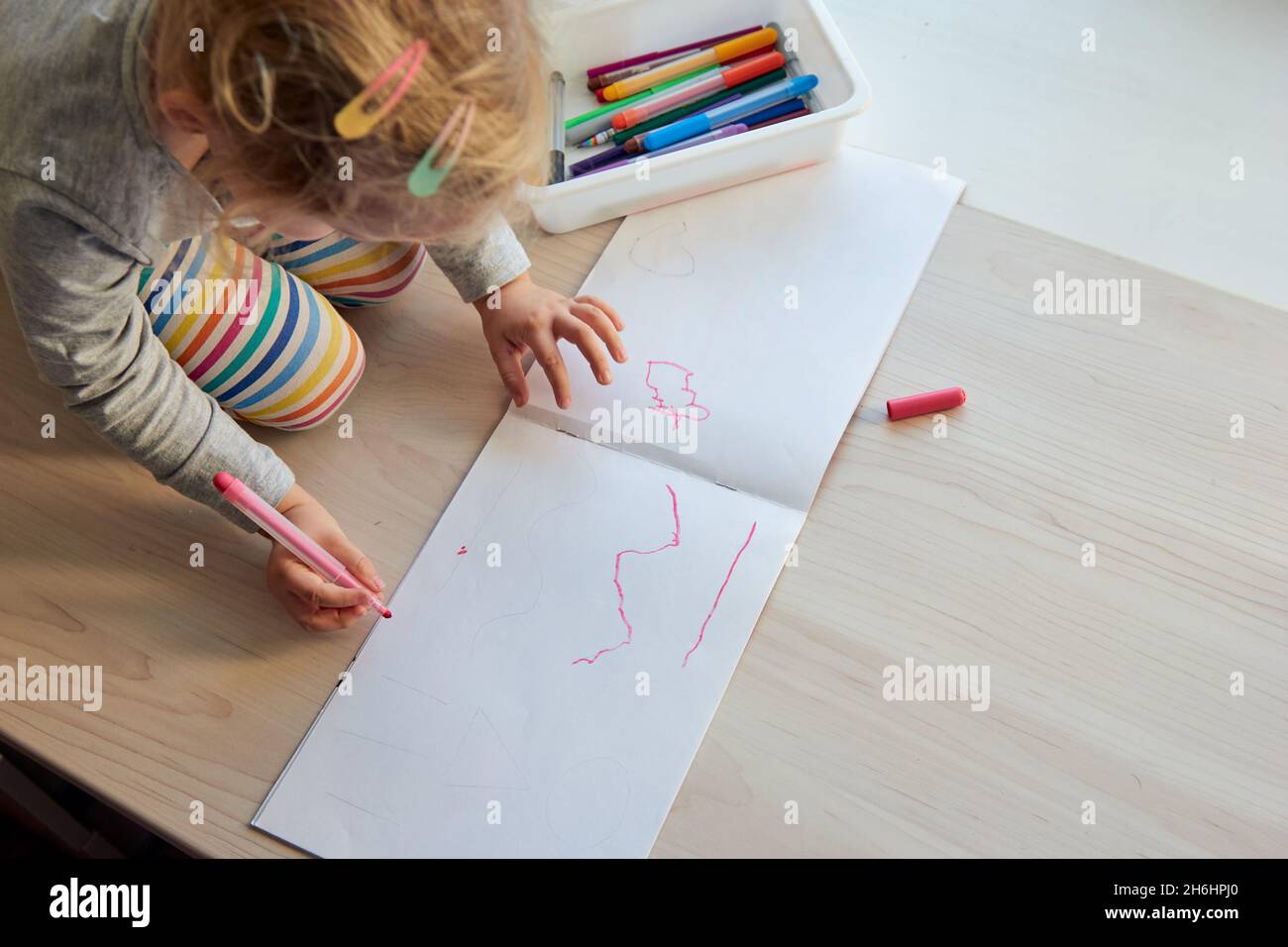 3 years girl creative arts. Child raws a picture. Kindergarden and ...