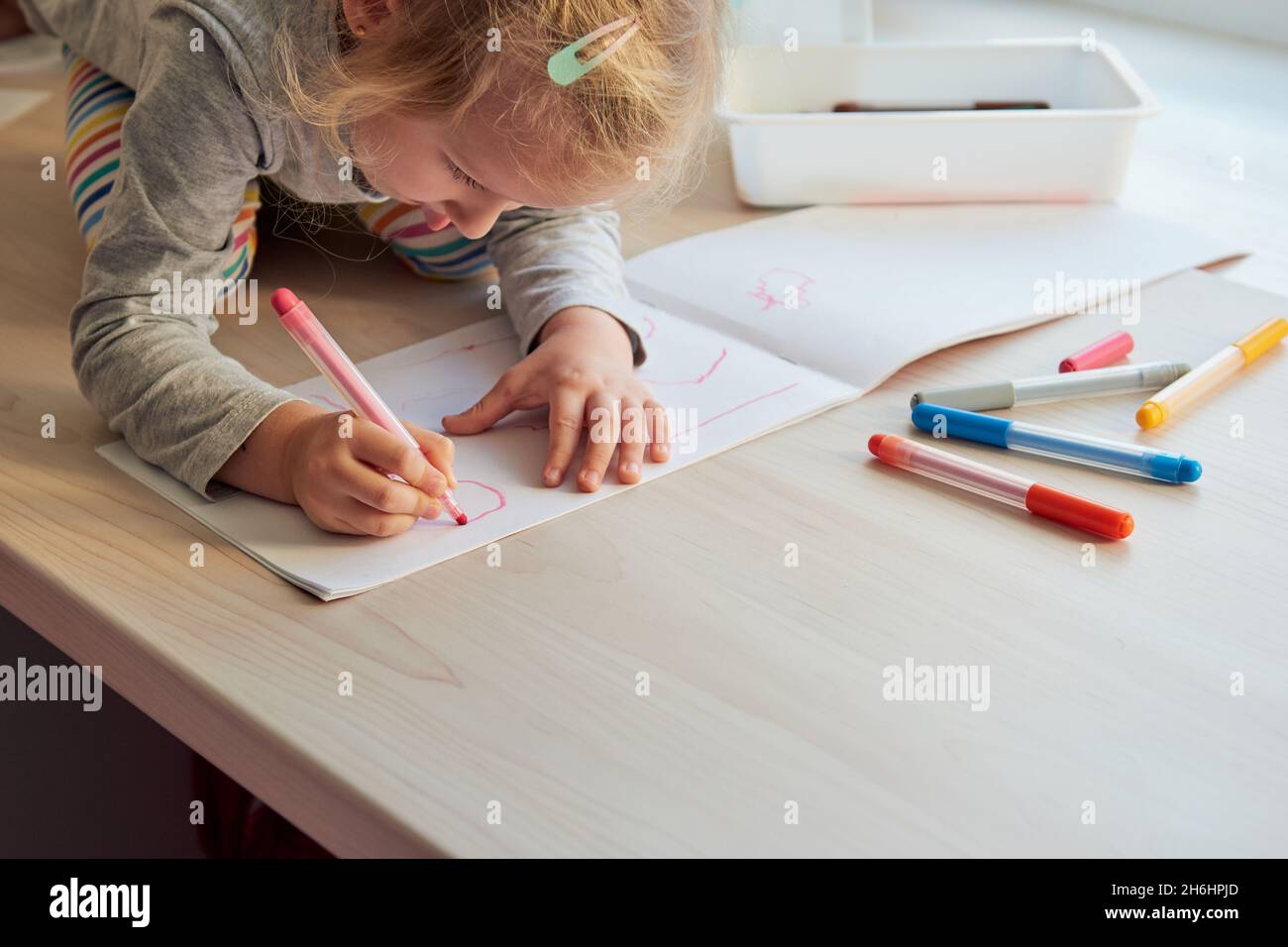3 years girl creative arts. Child raws a picture. Kindergarden and ...