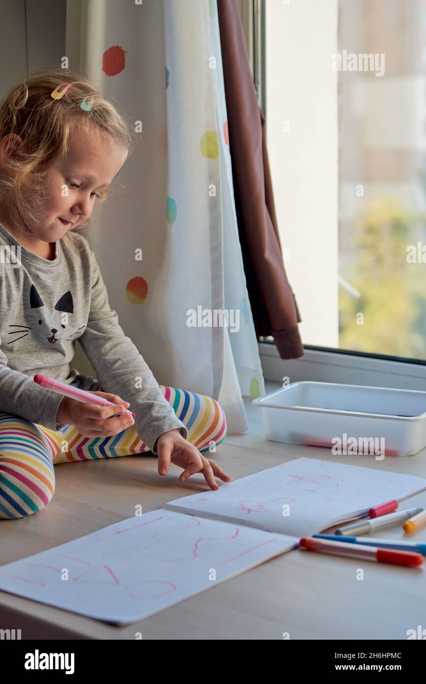 3 years girl creative arts. Child raws a picture. Kindergarden and ...