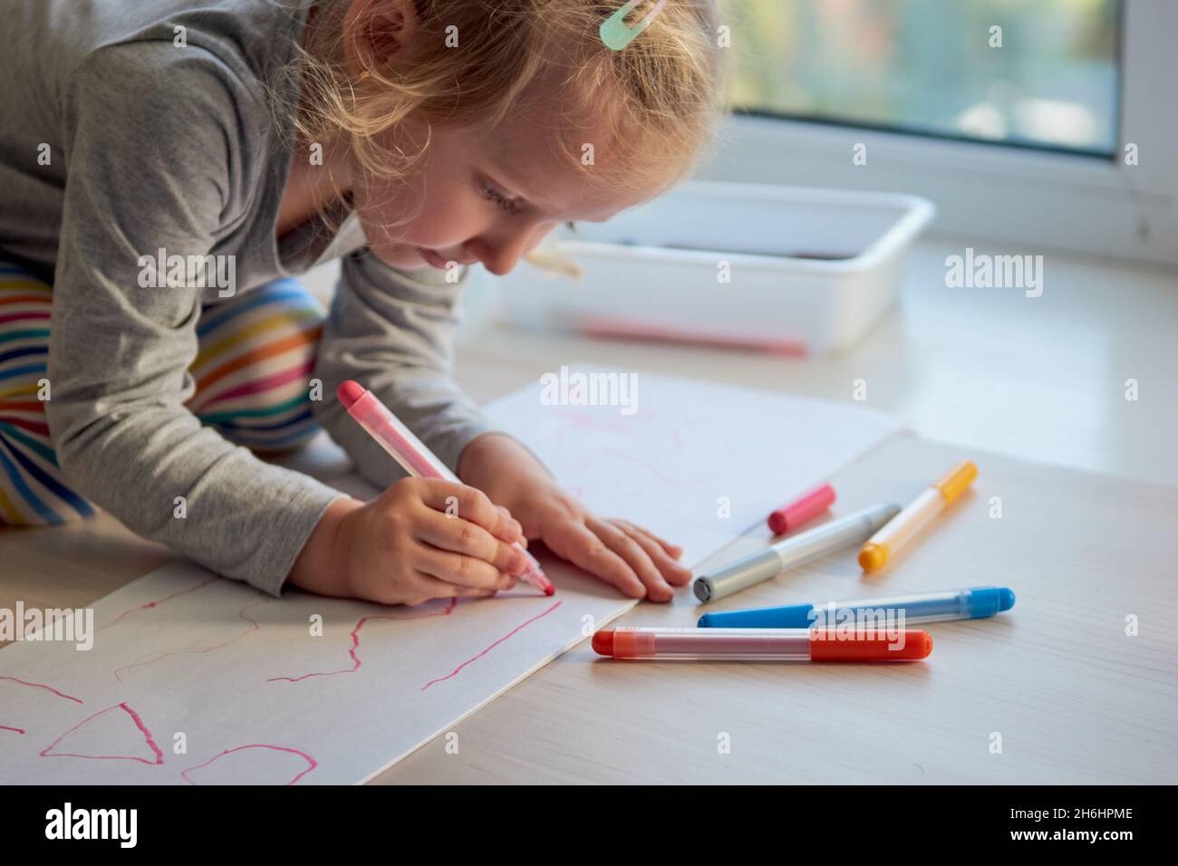 3 years girl creative arts. Child raws a picture. Kindergarden and ...