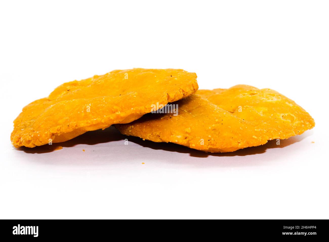 Crispy and salty mathri on white background with selective focus Stock ...
