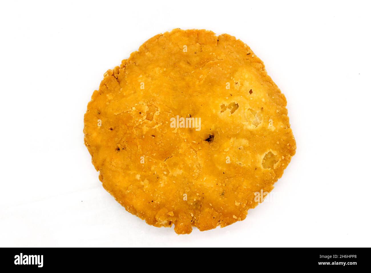 Crispy and salty mathri on white background with selective focus Stock ...
