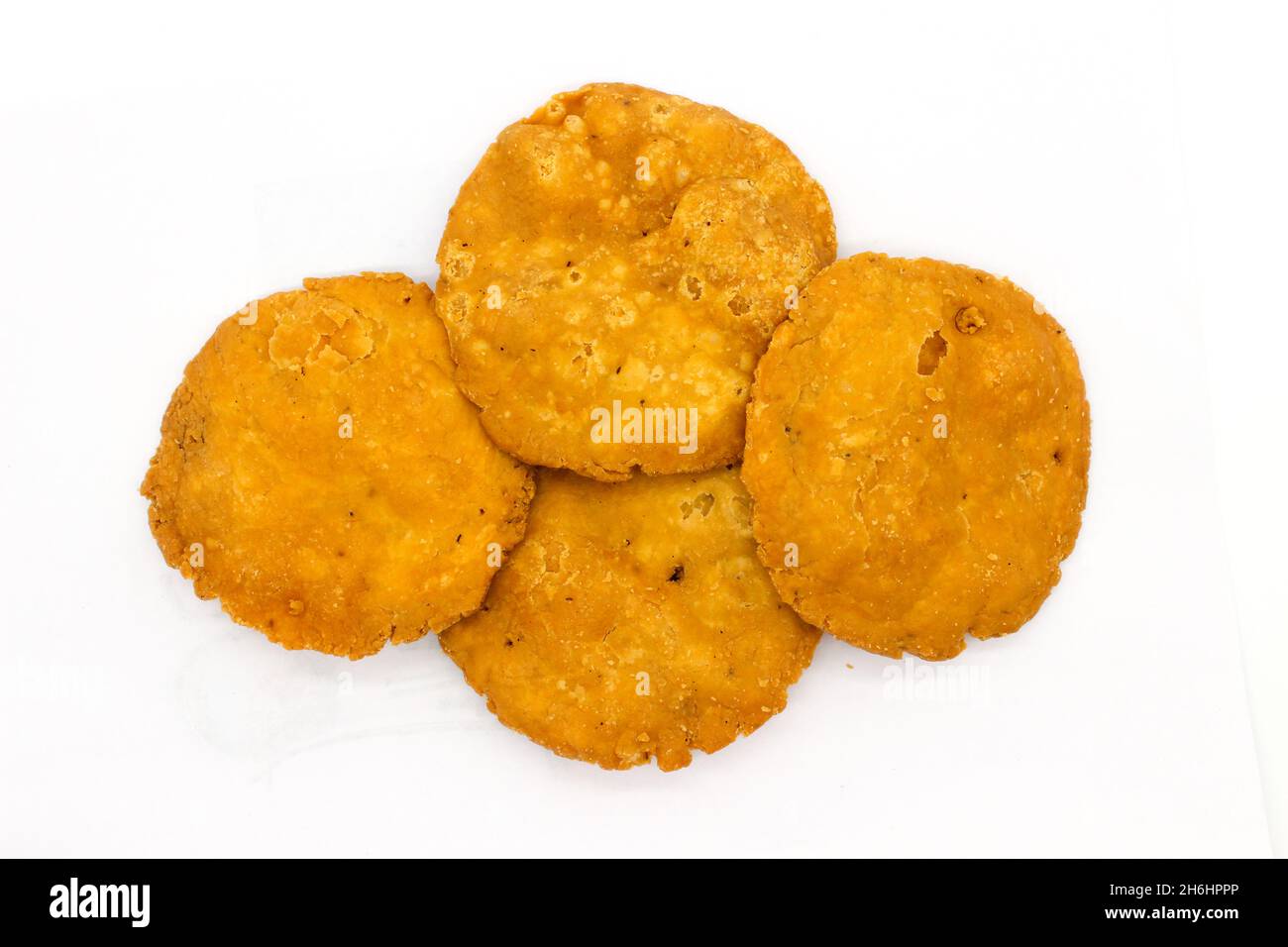 Crispy and salty mathri on white background with selective focus Stock ...