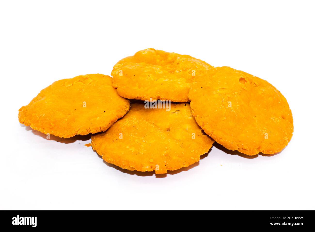 Crispy and salty mathri on white background with selective focus Stock ...
