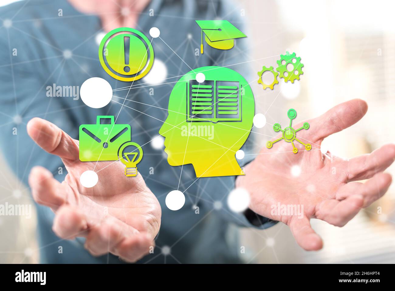 Knowledge concept above the hands of a man in background Stock Photo ...