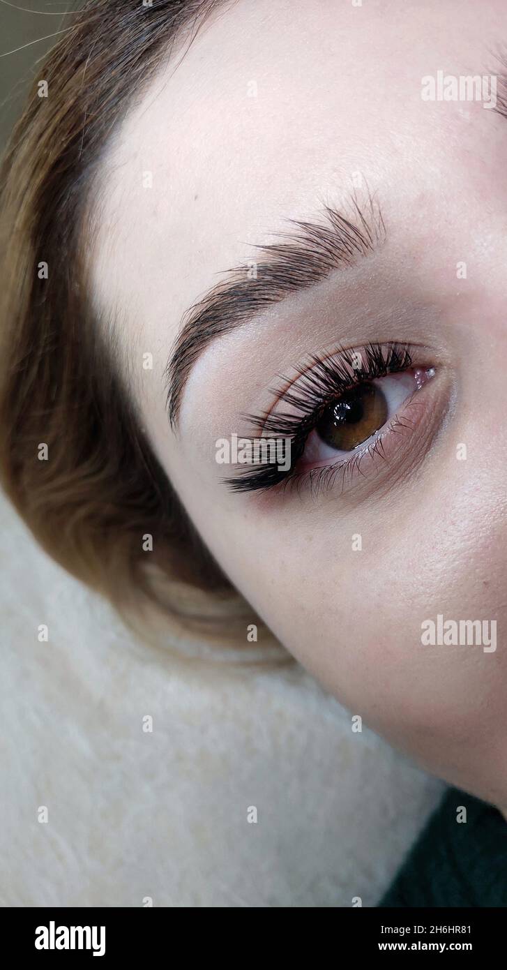 Lash extensions in beauty salon macro eye top view Stock Photo - Alamy