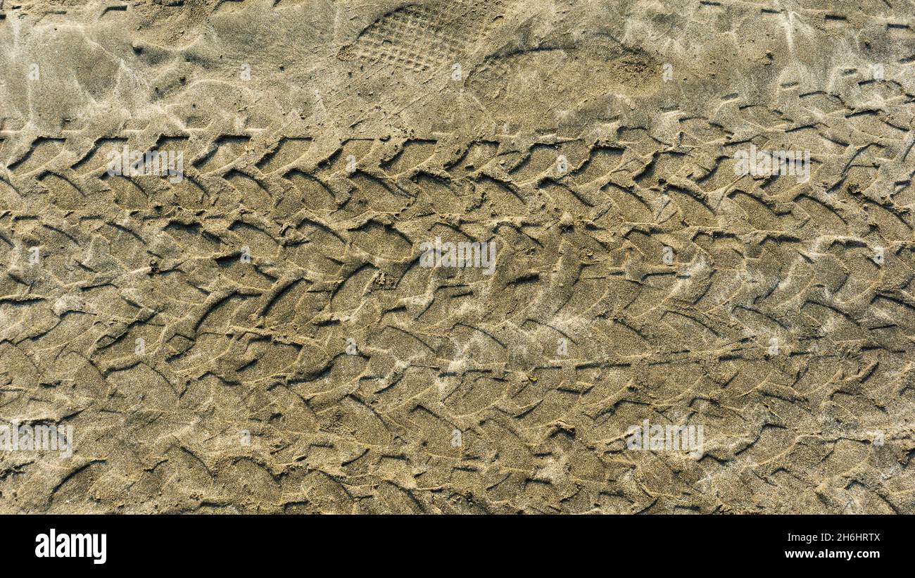 Top view of tire tracks on a sand Stock Photo - Alamy
