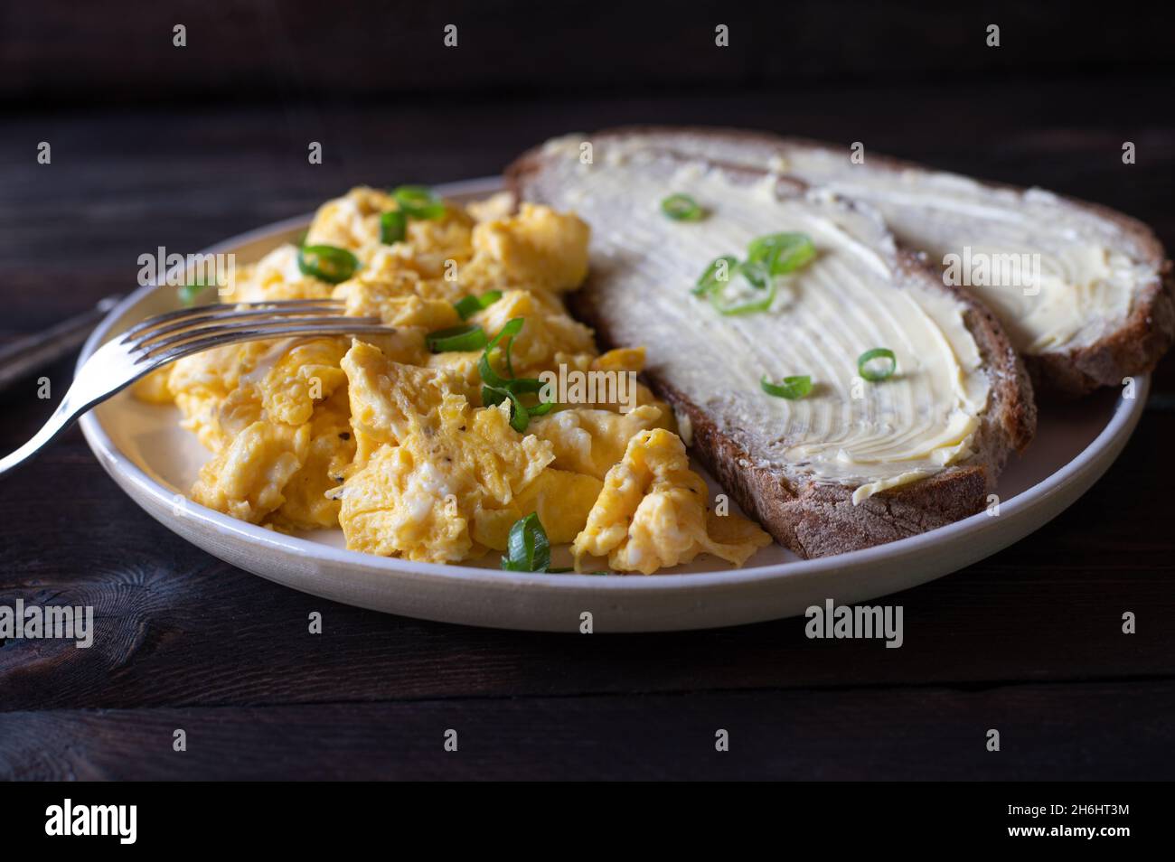 Scrambled eggs on sourdough bread hi-res stock photography and images ...