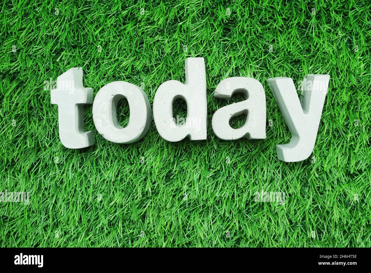 today word alphabet letter Top view on green artificial grass ...