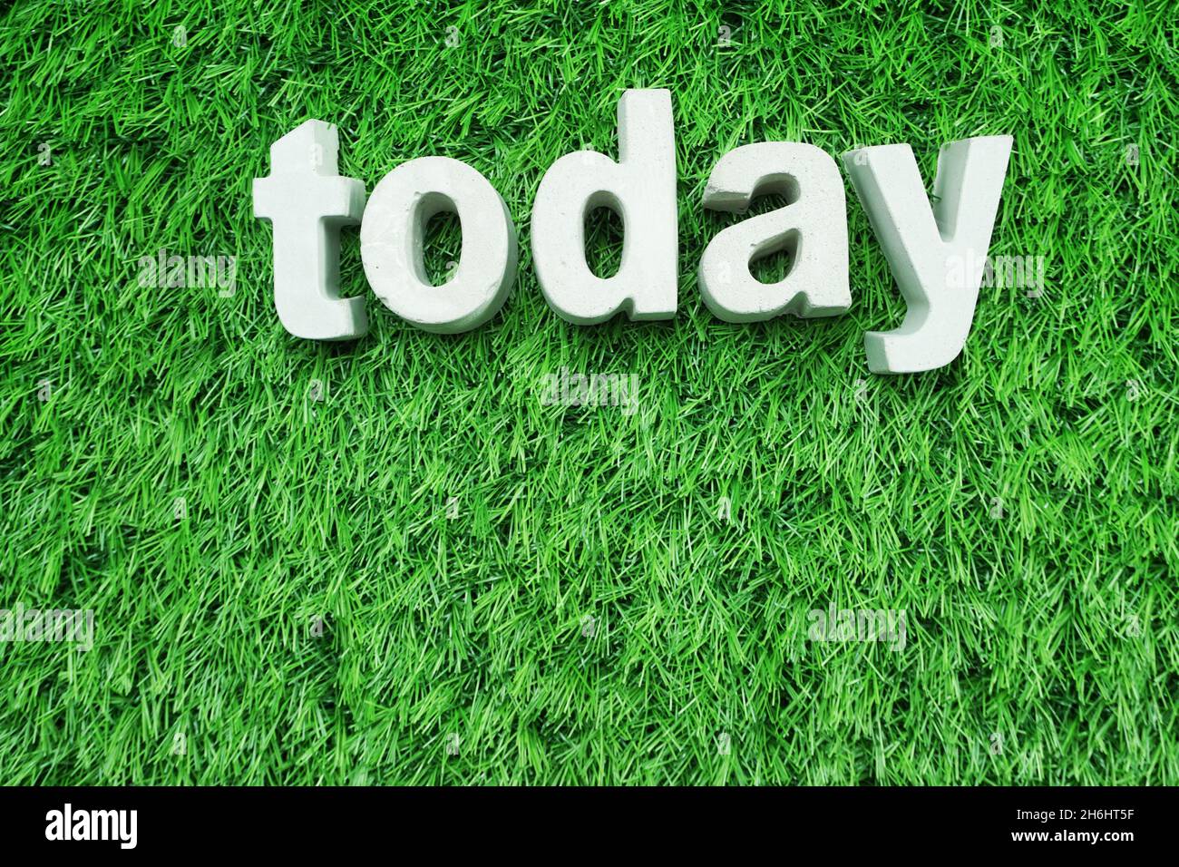today word alphabet letter Top view on green artificial grass ...