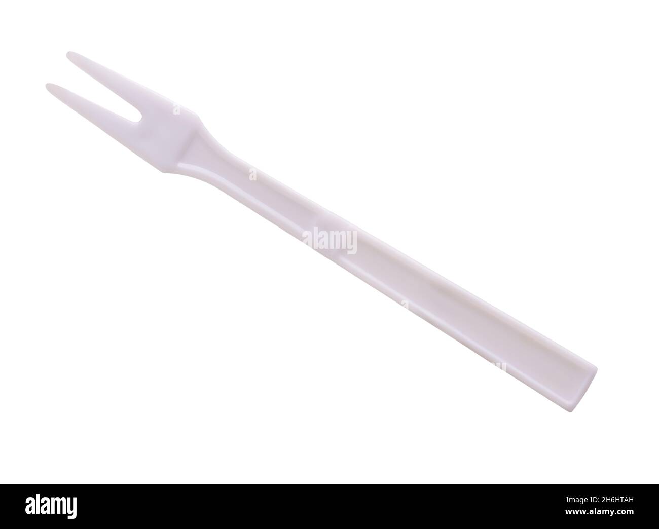 White disposable plastic fruit cocktail fork isolated on white Stock ...