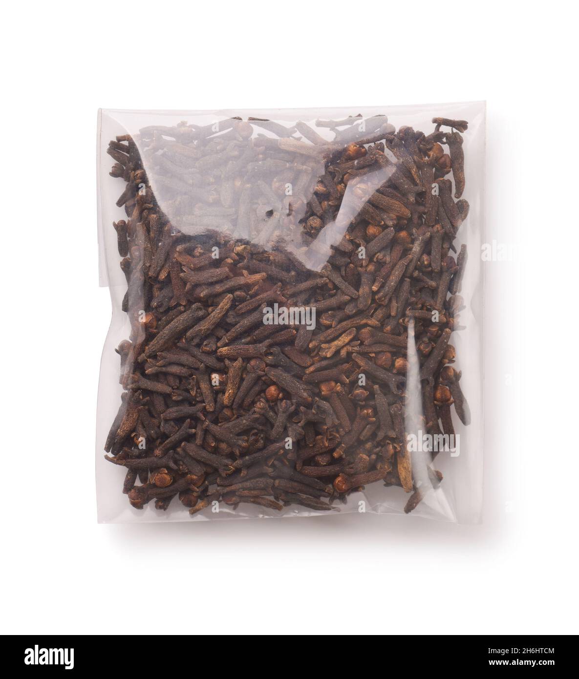Top view of dried cloves in plastic bag isolated on white Stock Photo ...