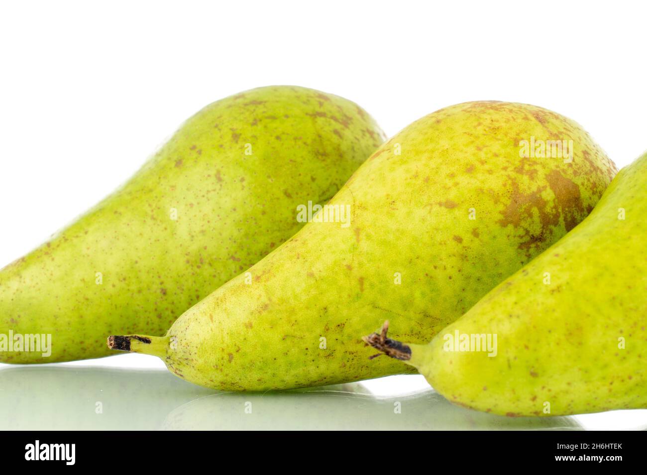 Three ripe green pears, close-up, isolated on white Stock Photo - Alamy