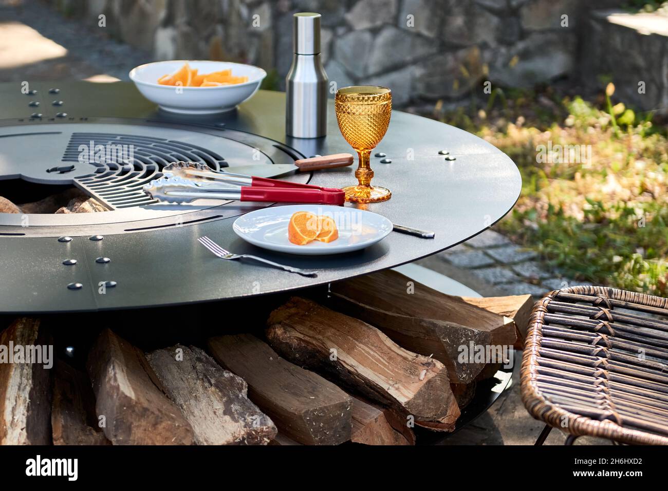 Kettle Grill Pit with Cast Iron Grid. Round table-cooking surface with ...