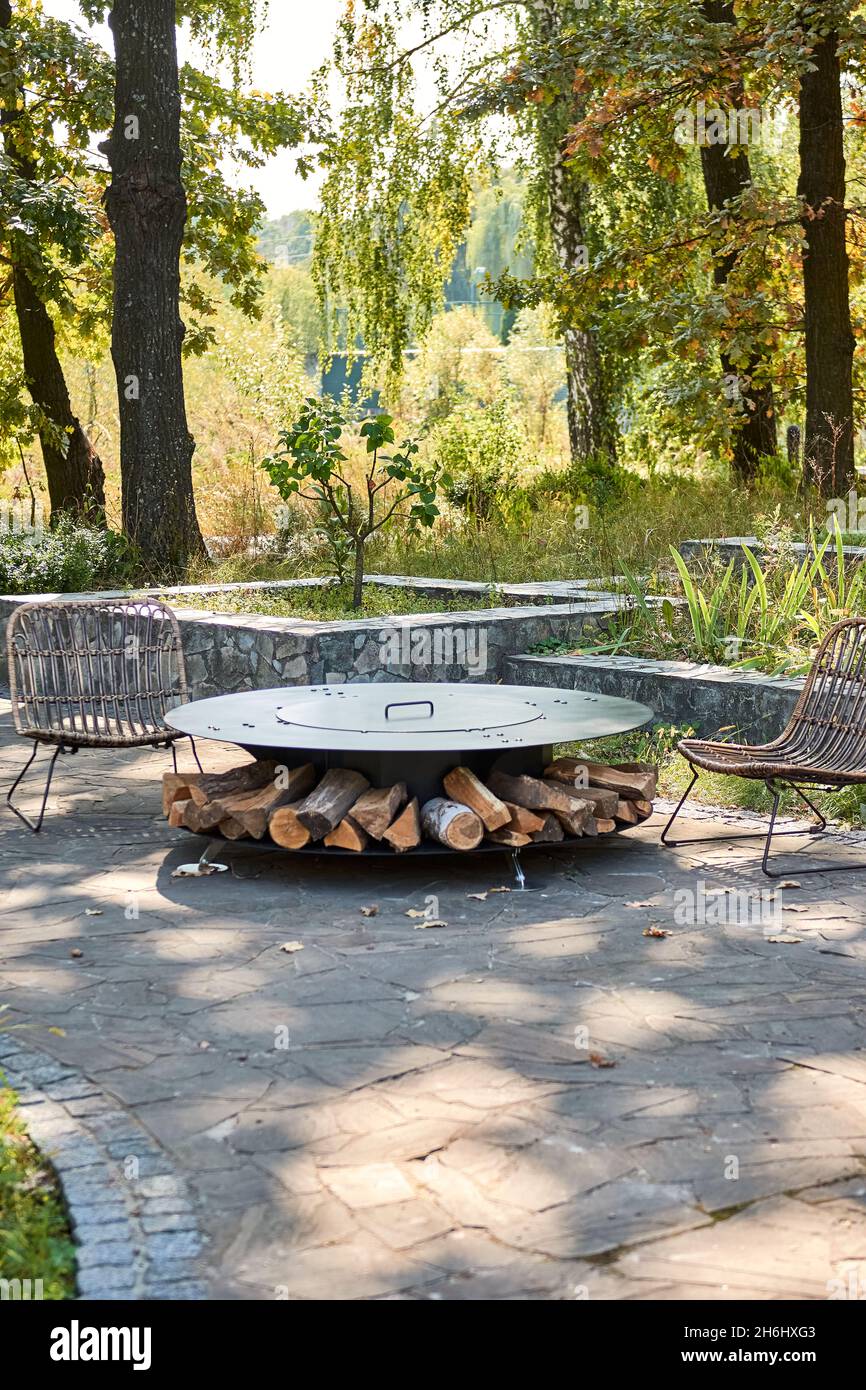 Kettle Grill Pit with Cast Iron Grid. Round table-cooking surface with ...