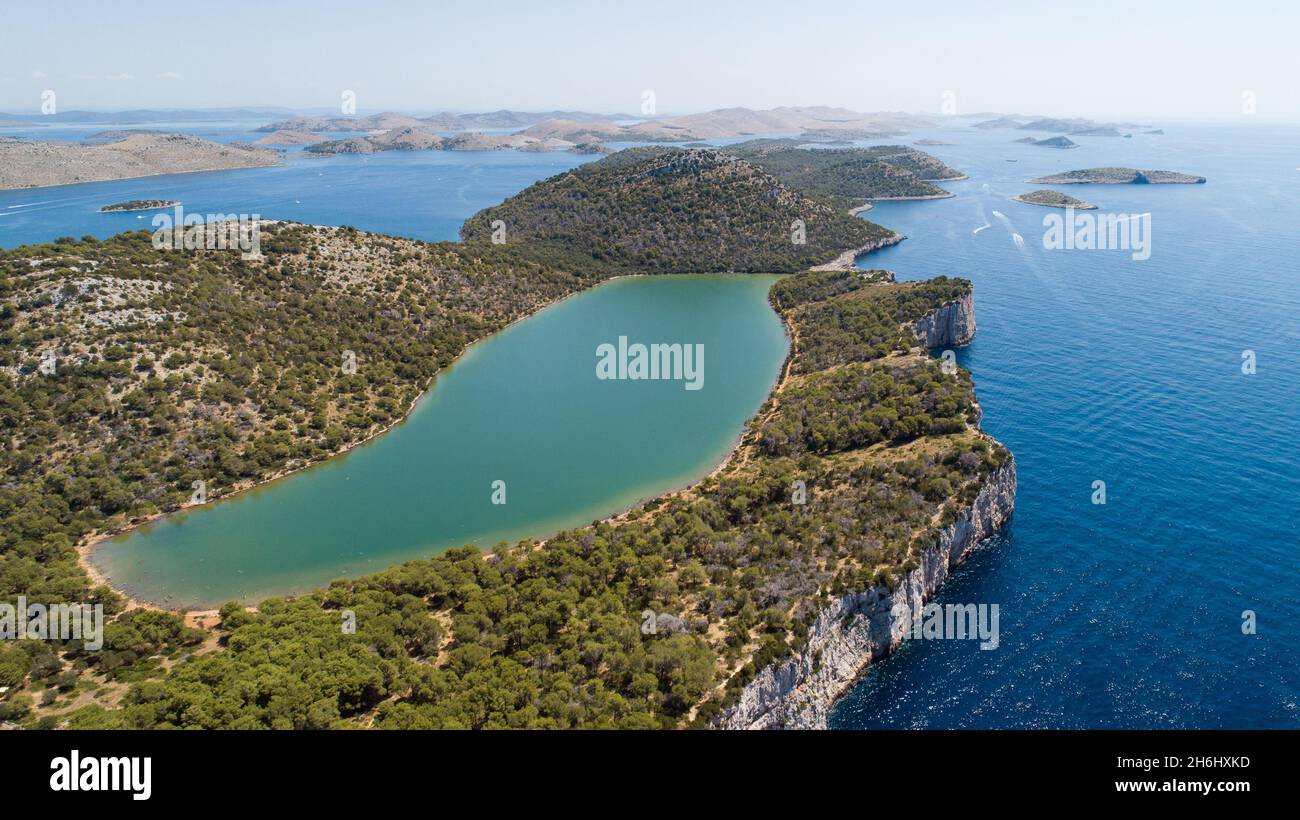 Aerial view of the salt lake Mir in Nature Park Telascica, Croatia ...