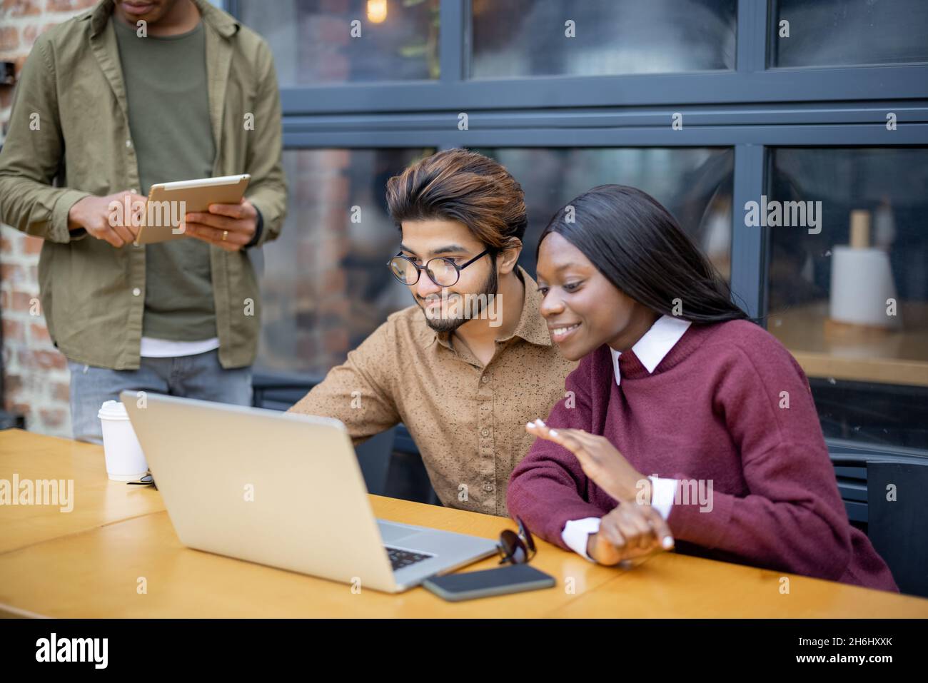 Multiracial students having video call on laptop Stock Photo - Alamy