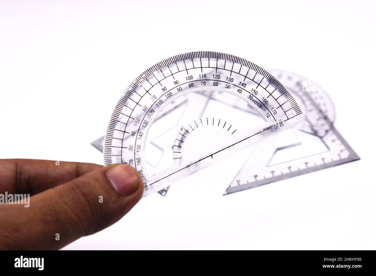 Protecter maths isolated on white background with selective focus Stock ...