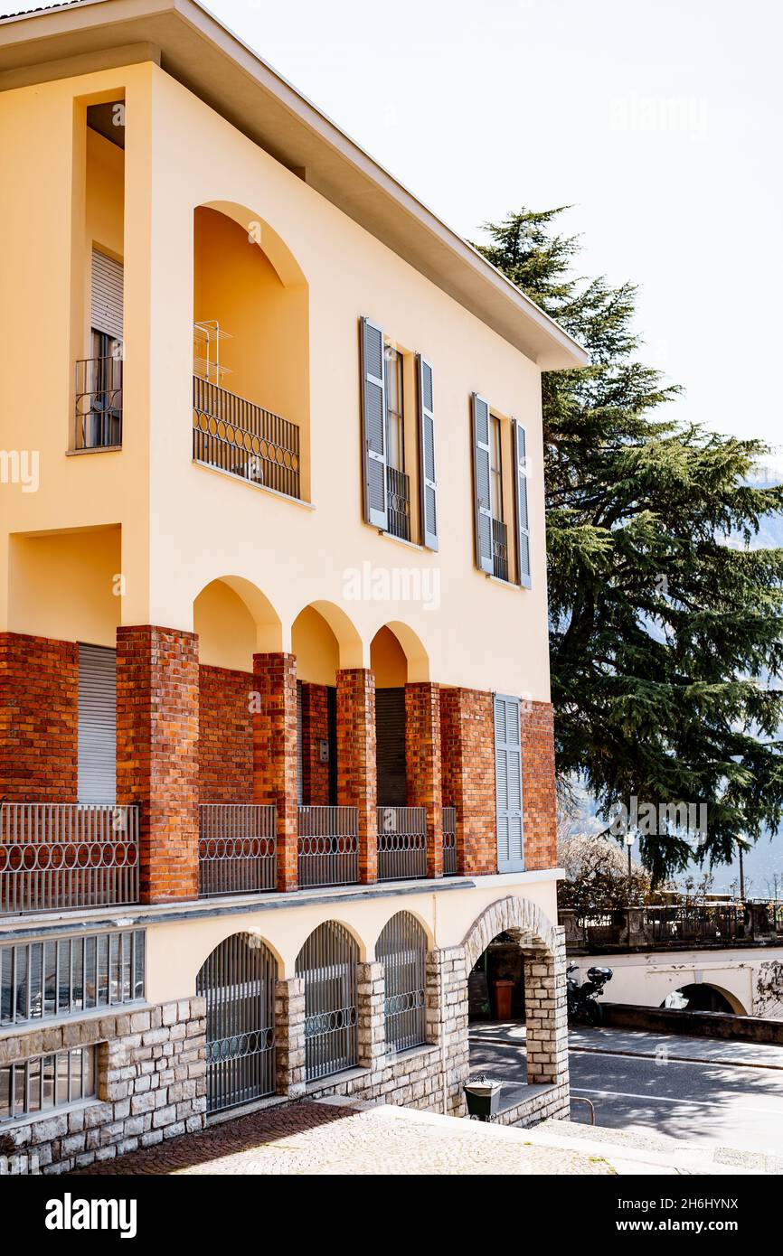 Colorful facade of the villa with arched windows. Como, Italy Stock ...