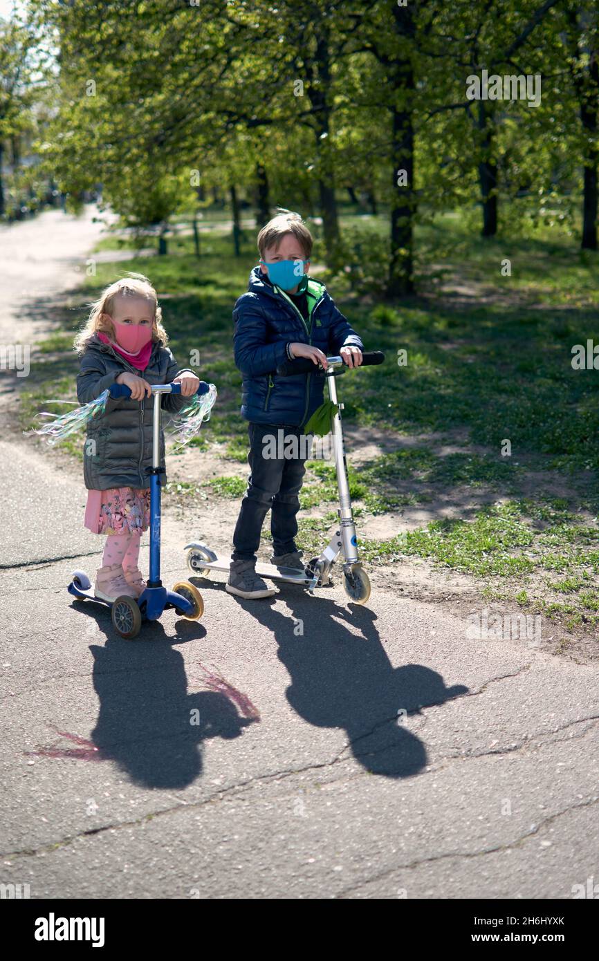 Girl and boy in face mask. Children wear facemask for protect during ...