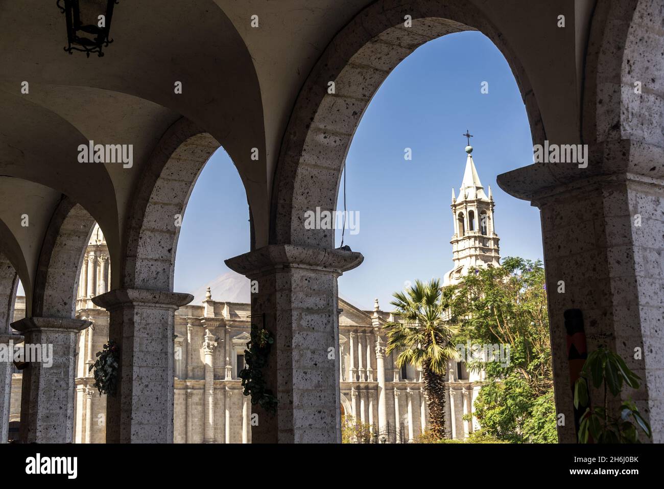 Looking through arches at the cathedral in the center of Arequipa, Peru ...