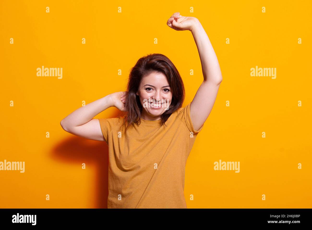 Happy person doing dance moves in front of camera, having fun with ...