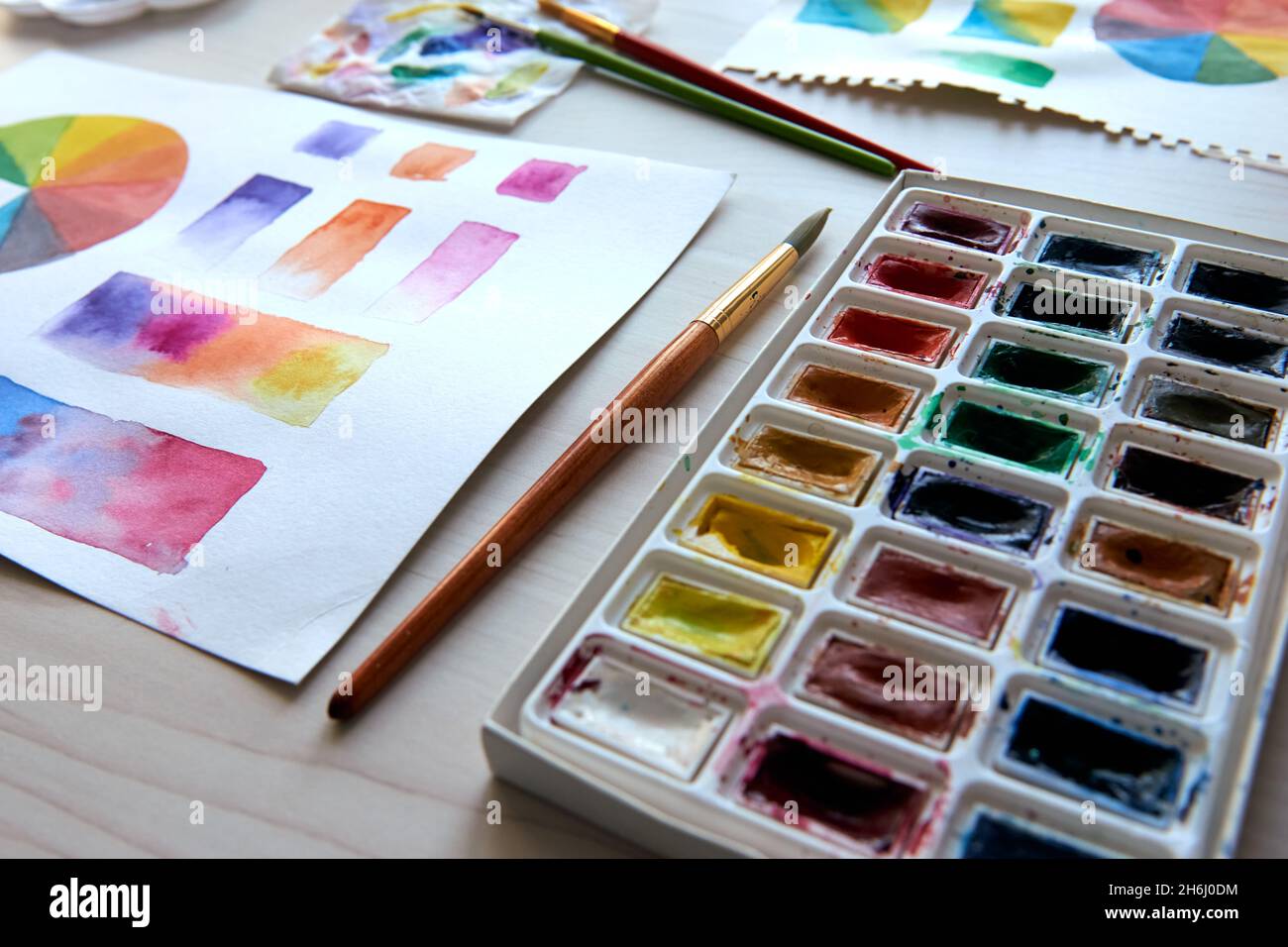 Artist's workplace. Art supplies brushes, paints, watercolors. Art ...