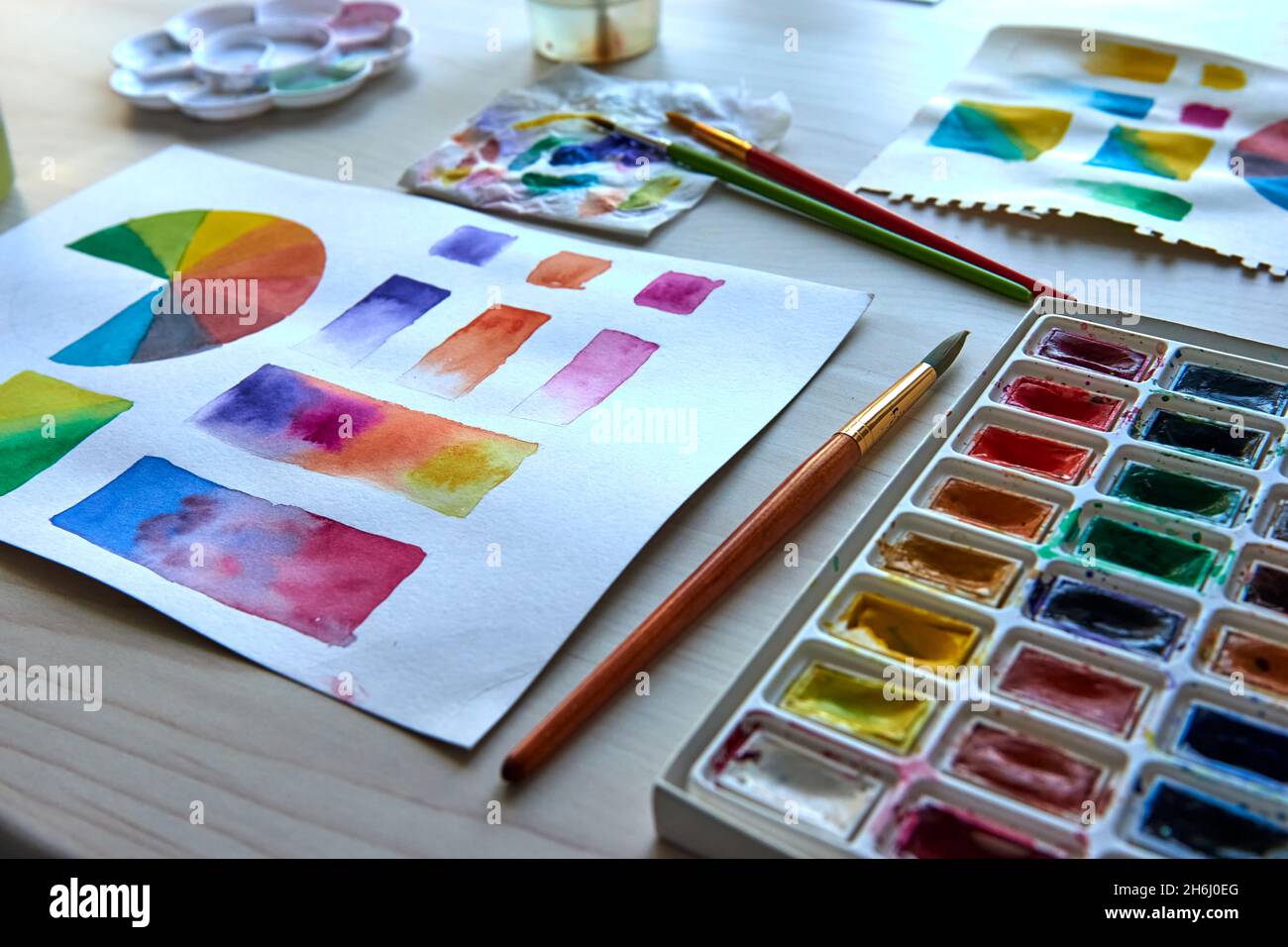 Artist's workplace. Art supplies brushes, paints, watercolors. Art ...