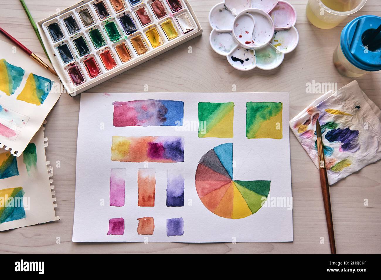 Artist's workplace. Art supplies brushes, paints, watercolors. Art ...