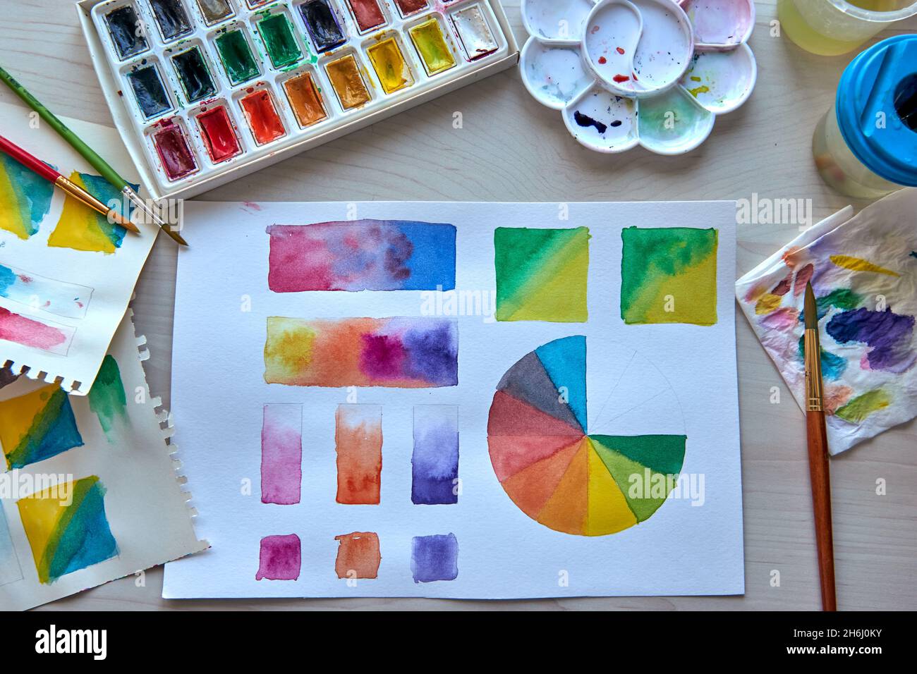 Artist's workplace. Art supplies brushes, paints, watercolors. Art ...