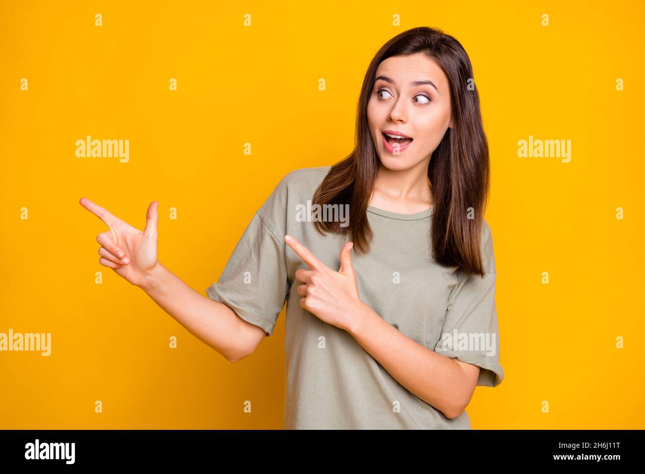 Photo of young happy shocked excited amazed positive girl look point ...