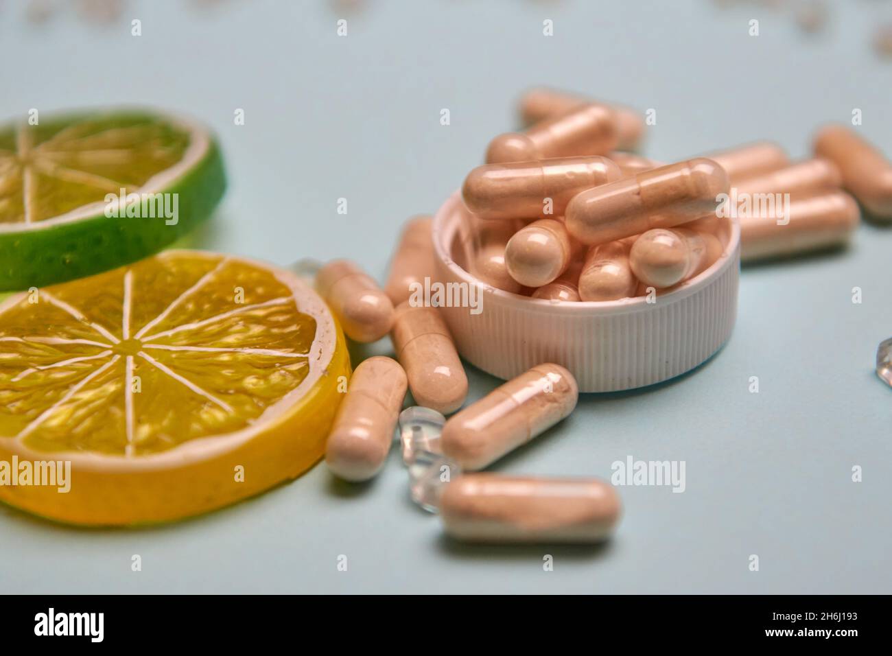Many pills on a colorful background. Supplements and medicines that are ...