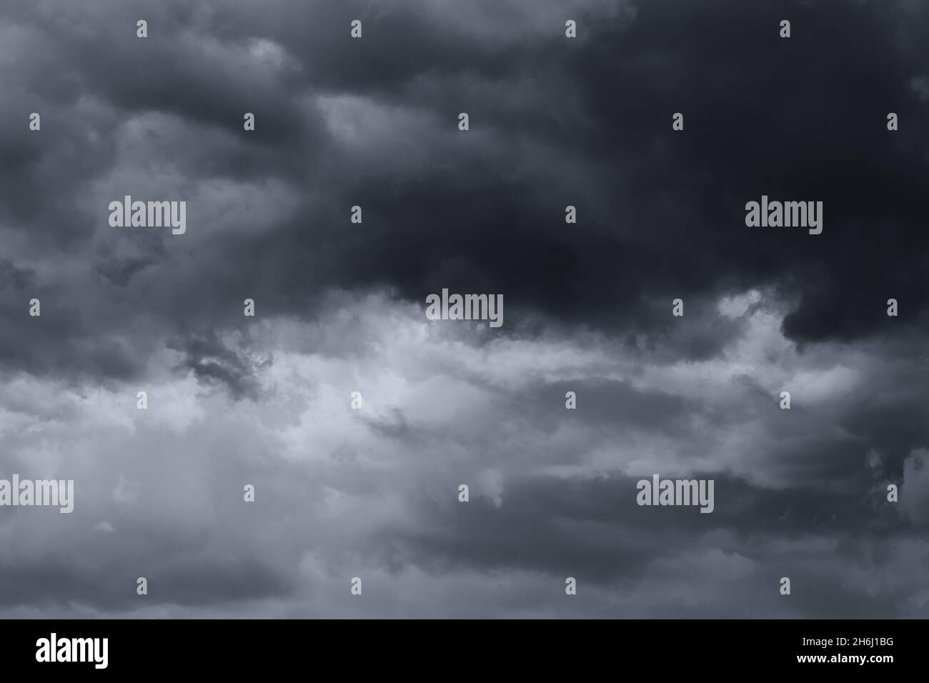 Dark monochrome heavy storm clouds before a thunderstorm or hurricane ...
