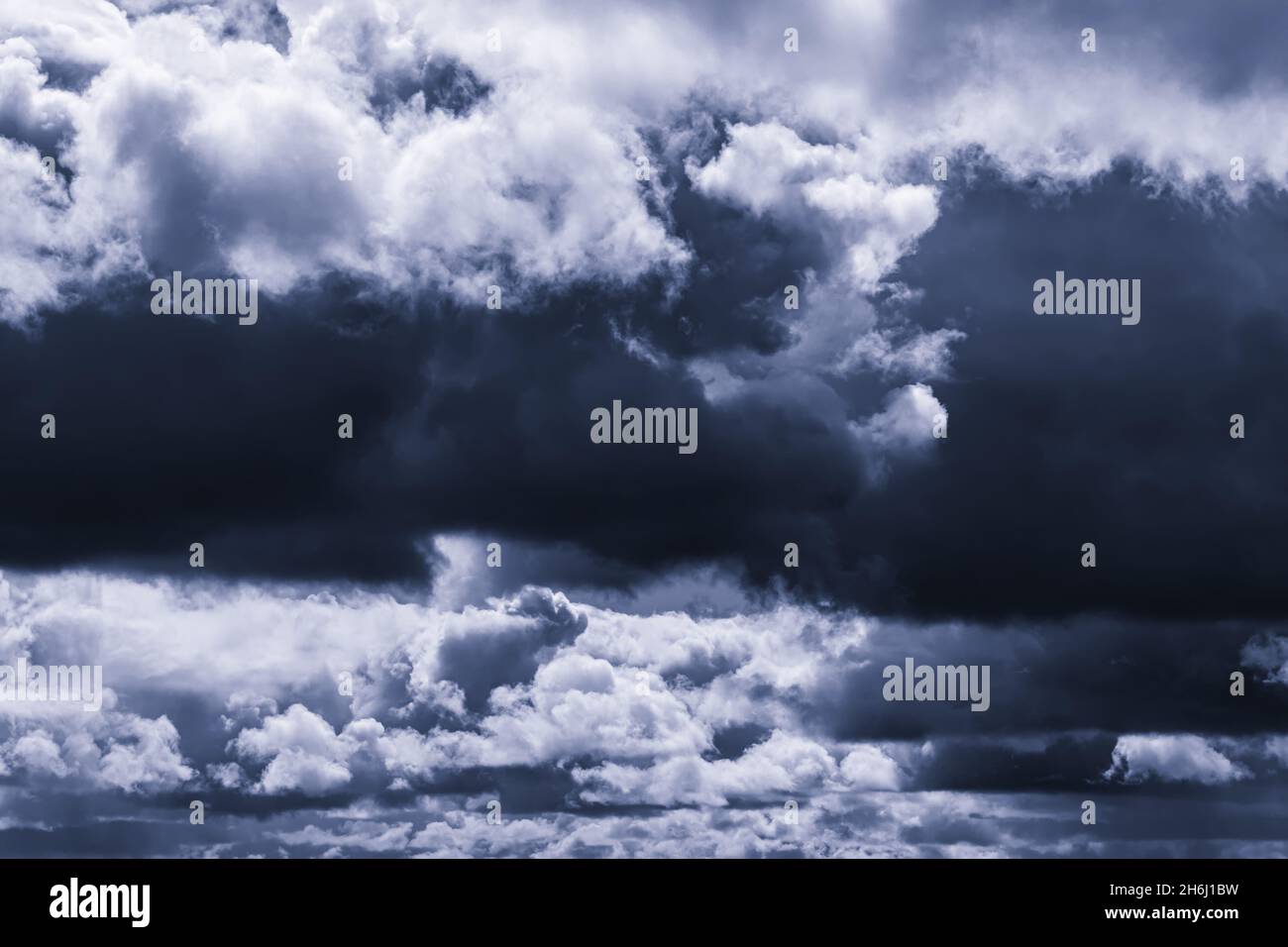 Dark monochrome heavy storm clouds before a thunderstorm or hurricane ...