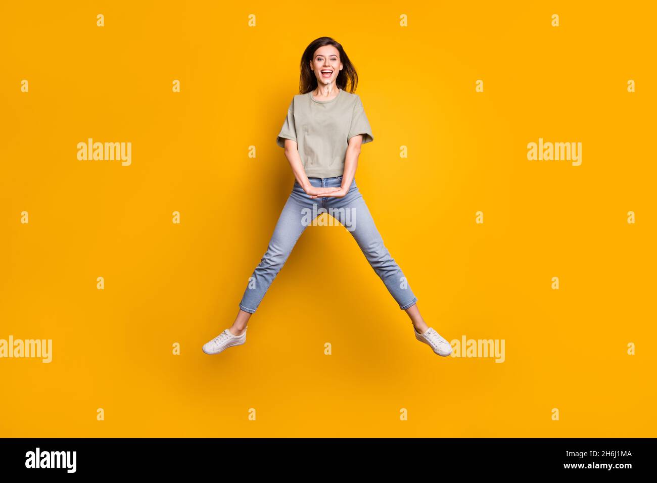 Full length body size view of lovely funny skinny cheerful girl jumping ...