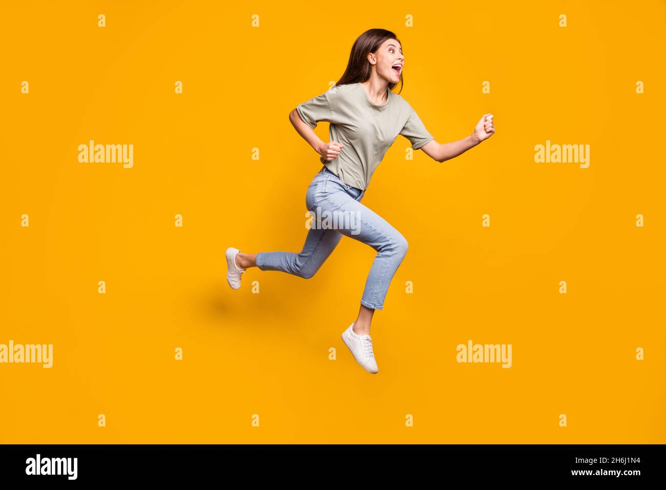 Full length body size view of lovely motivated cheerful girl jumping ...