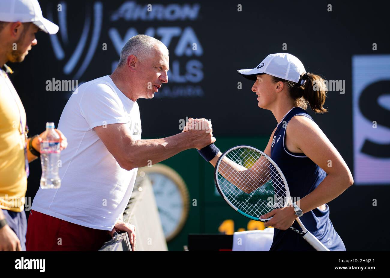 Iga Swiatek of Poland celebrates with her father after the third round ...