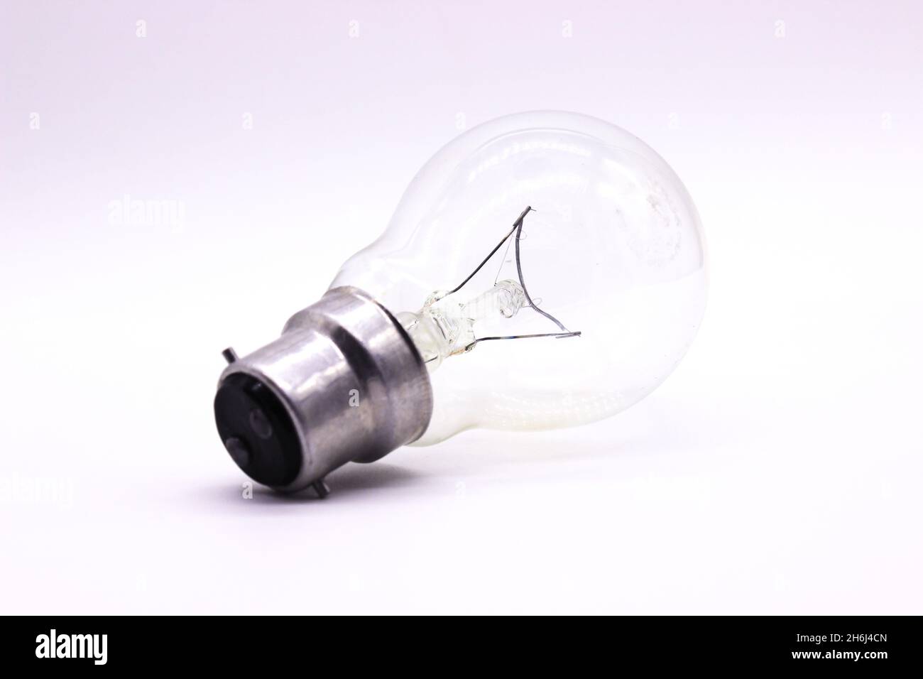light bulb on white background with selective focus Stock Photo - Alamy