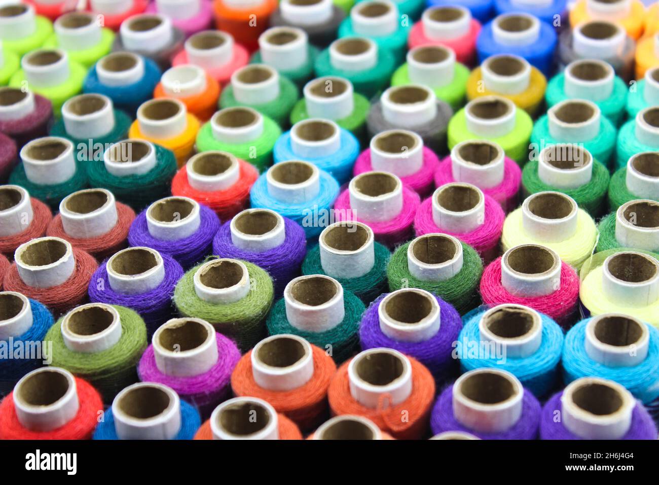 A picture of thread rolls with selective focus Stock Photo - Alamy