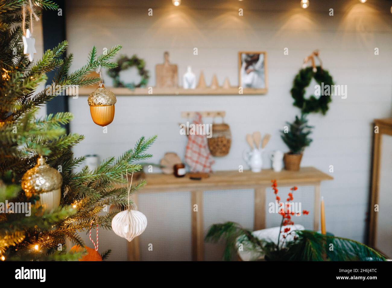 Close-up of a decorated Christmas tree with decorations in the interior ...