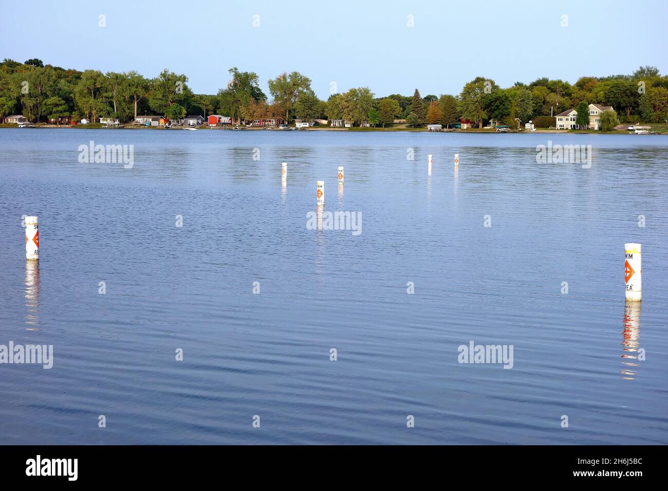 Lake surrounded by trees and houses, Waverly, Minnesota, USA Stock ...