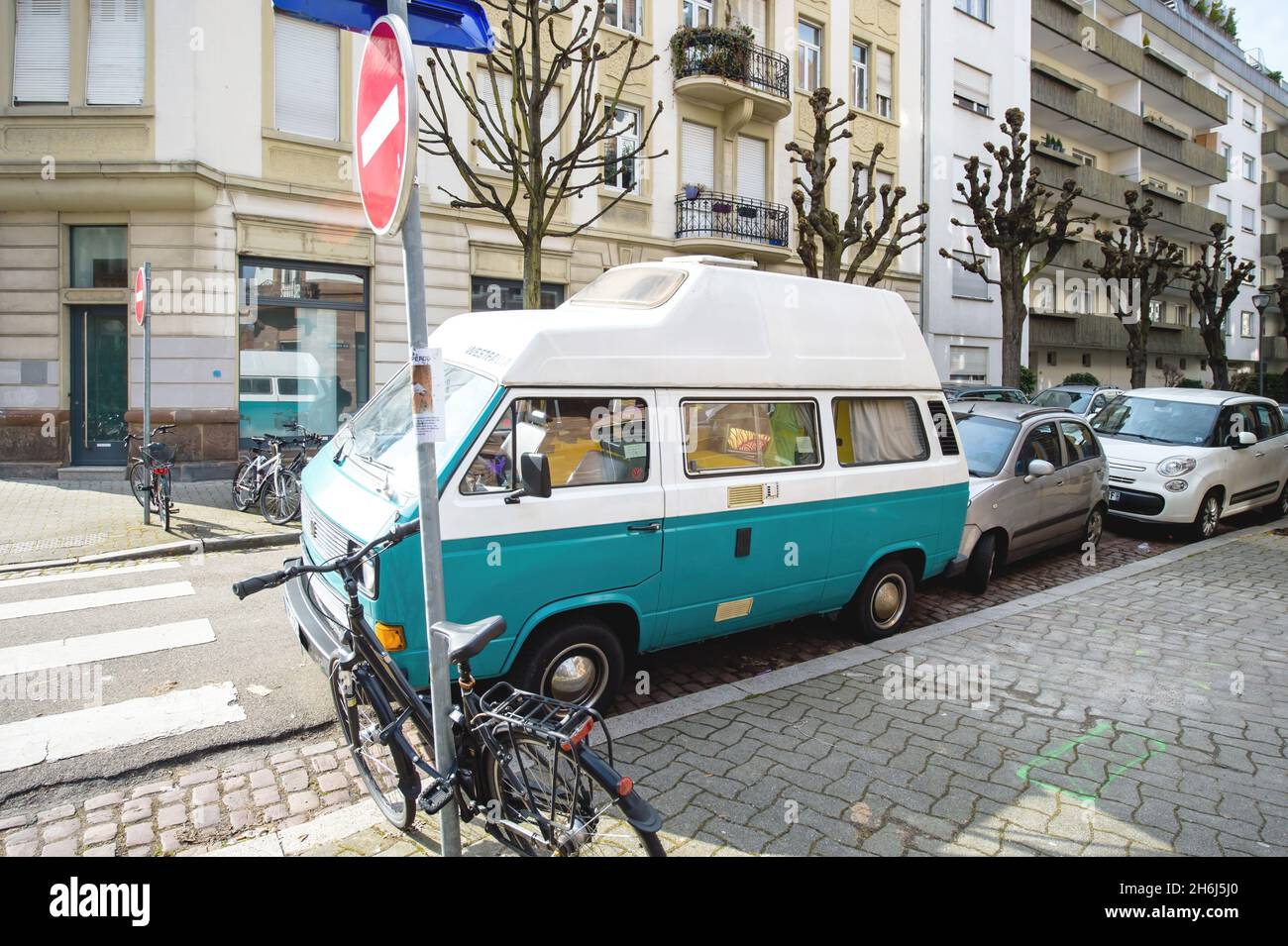 Side view of Volkswagen Westfalia van parked on the street near ...