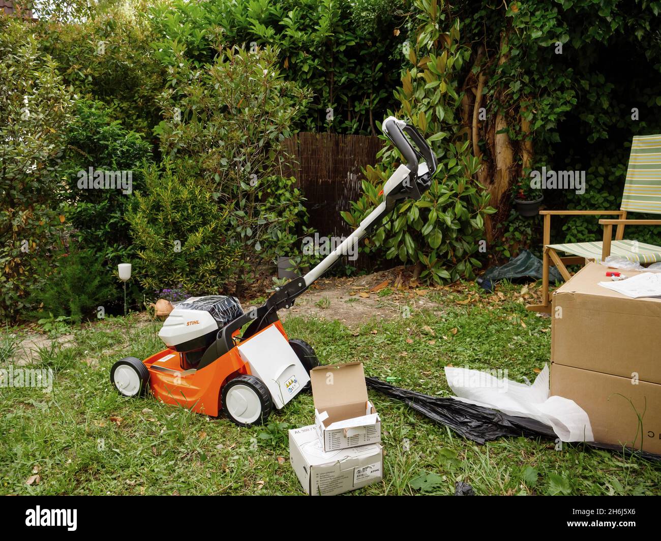 Unboxing process in the garden of new professional Stihl lawn mower ...