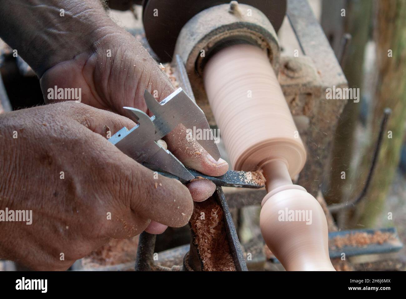 Senior hands turning wood Stock Photo - Alamy