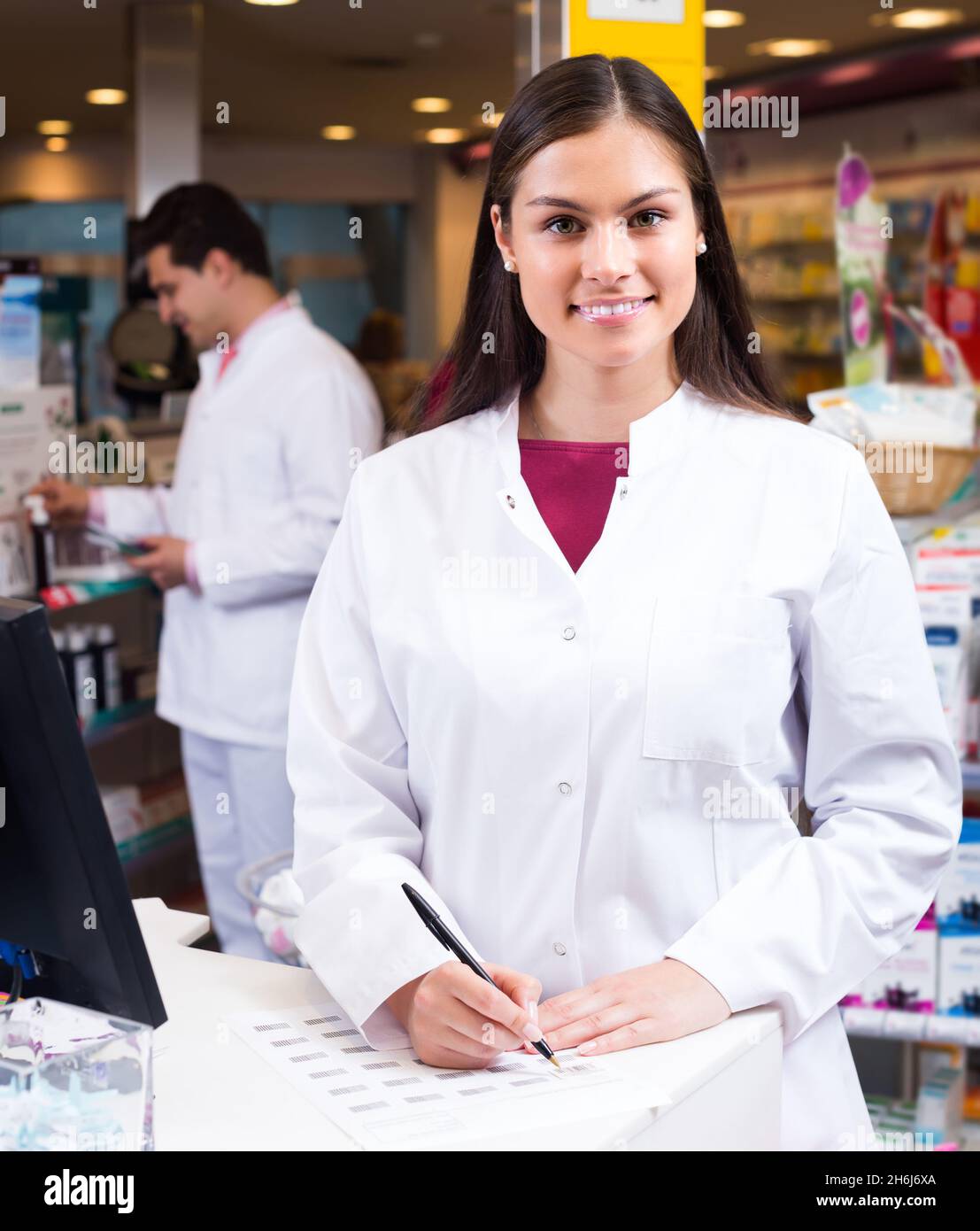 Young pharmacy staff hi-res stock photography and images - Alamy