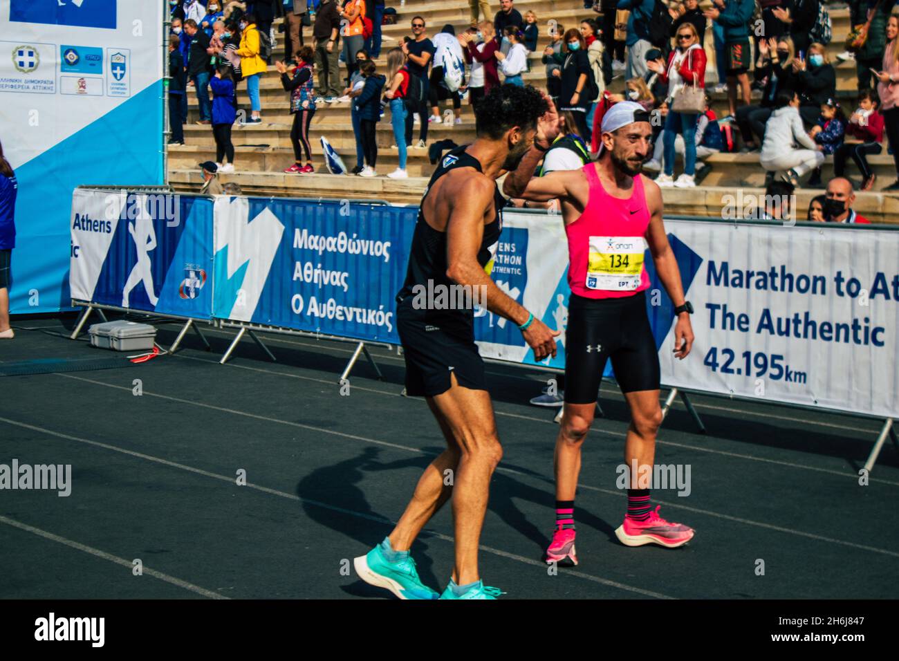 Runners at the finish of the 38th Authentic Athens Marathon, last year ...
