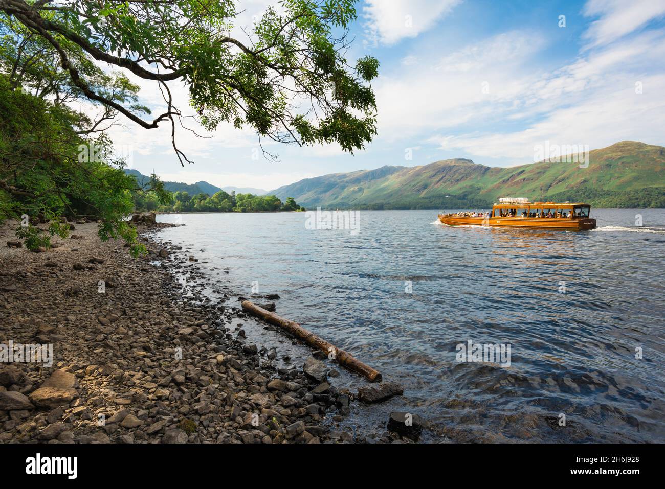 Boat tour Lake District, summer morning view of a ferry boat cruising ...