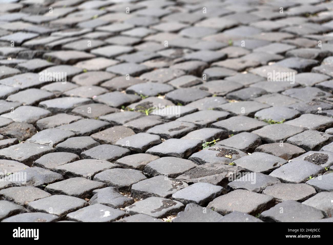 Sampietrini stone pavel road in rome Italy Stock Photo - Alamy