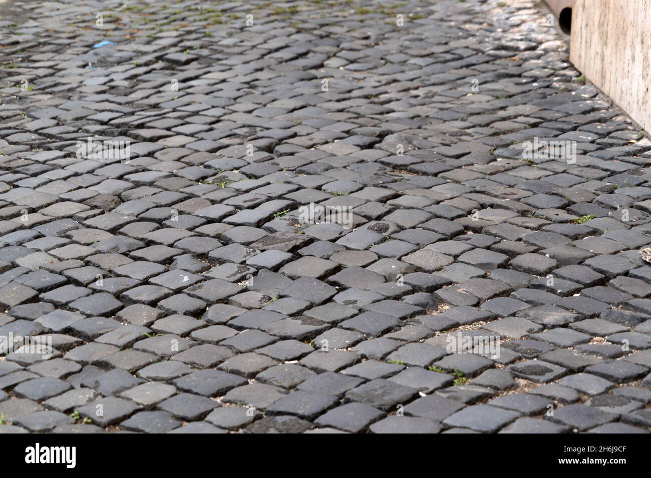 Sampietrini stone pavel road in rome Italy Stock Photo - Alamy