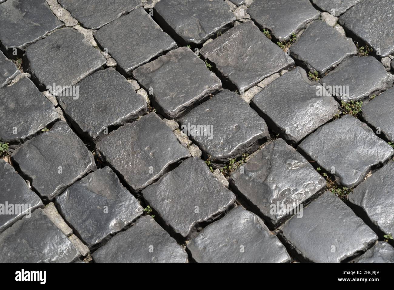 Sampietrini stone pavel road in rome Italy Stock Photo - Alamy